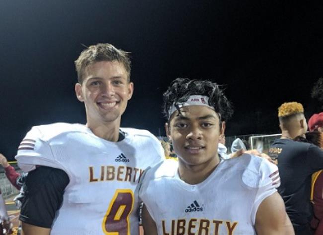 Liberty bests Cardinal Newman in battle of NCS divisional powers